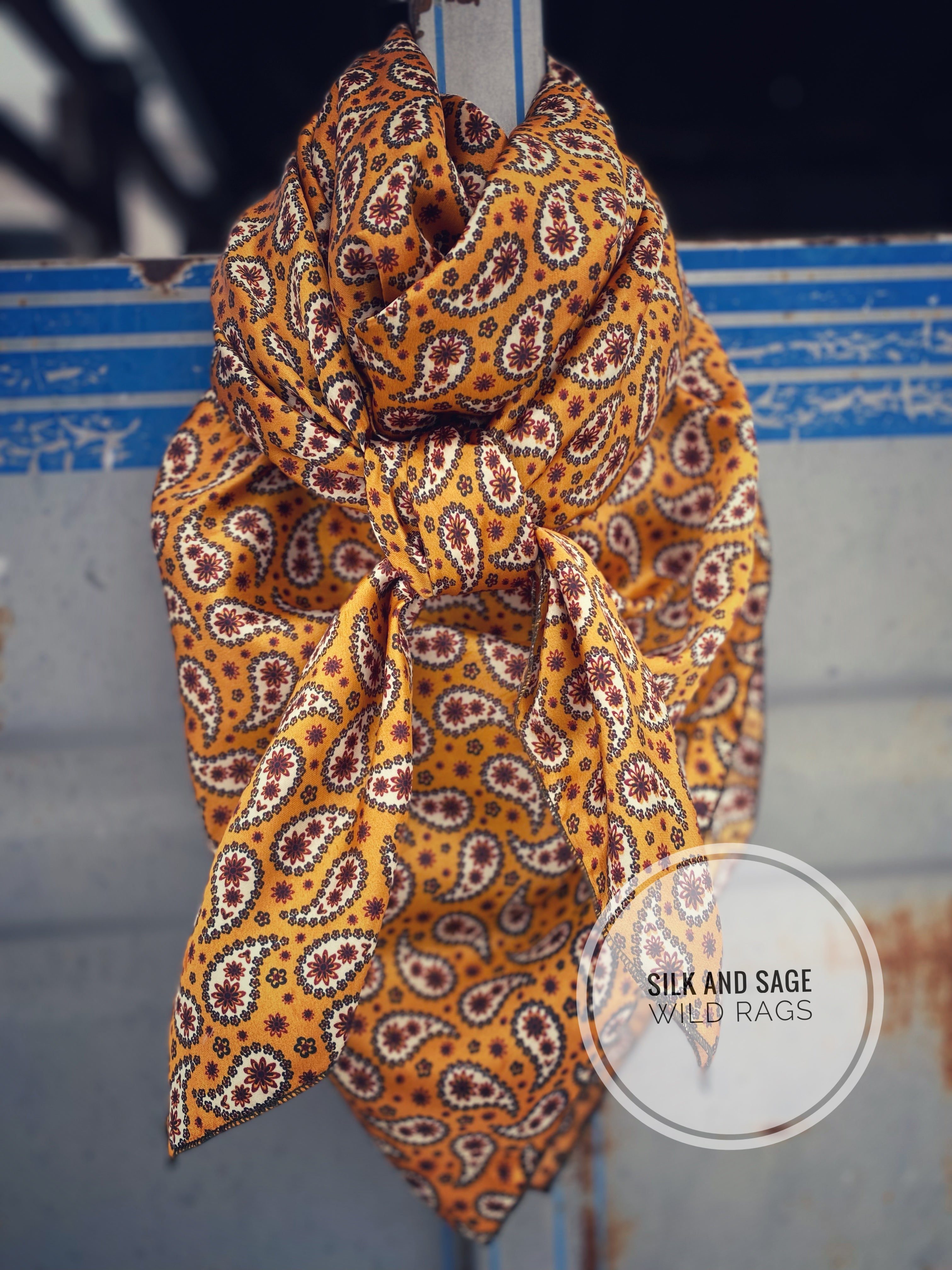 Bright mustard with rust, dark green and white paisley floral print on ...